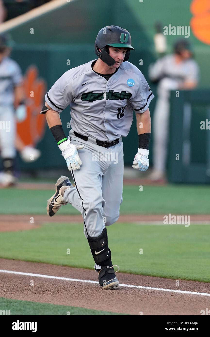 Preston Lucas (12) of the USC Upstate Spartans runs toward first base ...