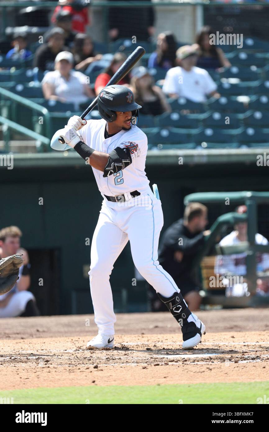 Edwardo Espinal (2) of the Inland Empire 66ers bats against the Modesto Nuts at San Manual ...