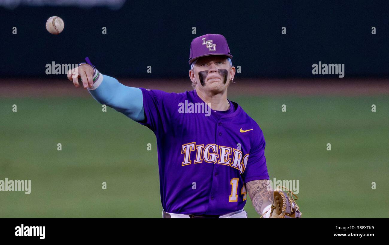 LSU infielder Daniel Dickinson (14) throws during an NCAA regional ...