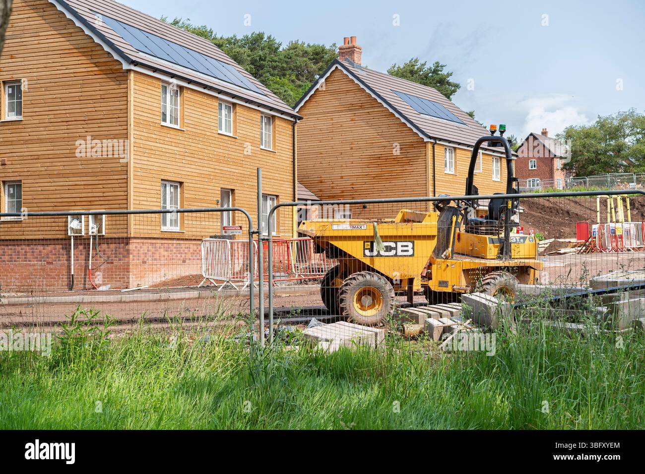 New homes being built with timber cladding to the building Stock Photo ...