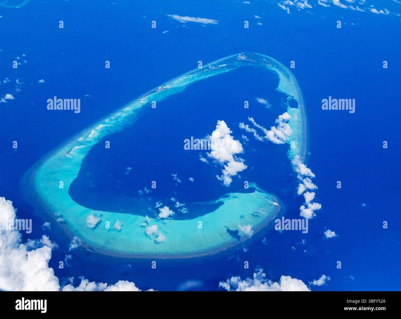 Aerial photo of coral islands and atolls, The Maldives, Indian Ocean ...