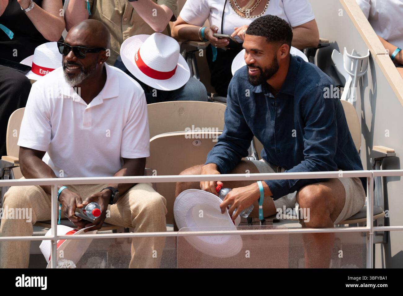 Ruben Loftus-Cheek and Steve Kabba attend the Roland Garros 2025 ...