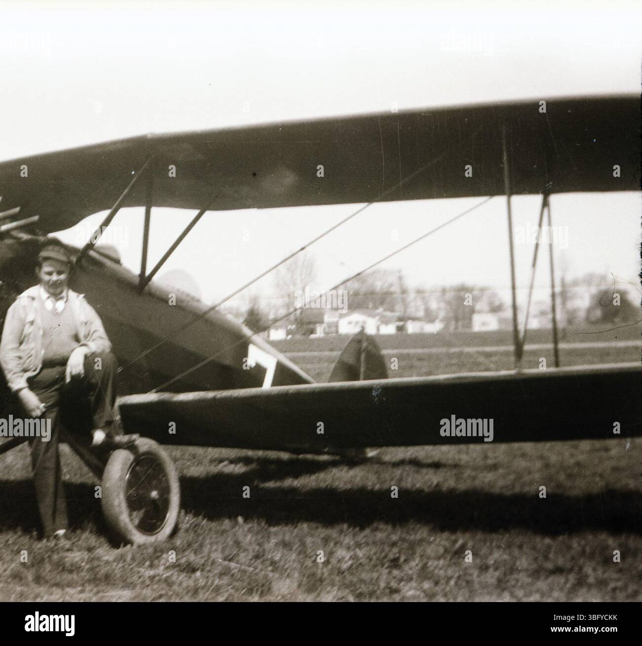 In 1930, George Sandusky is photographed with a bi-plane at Linden ...