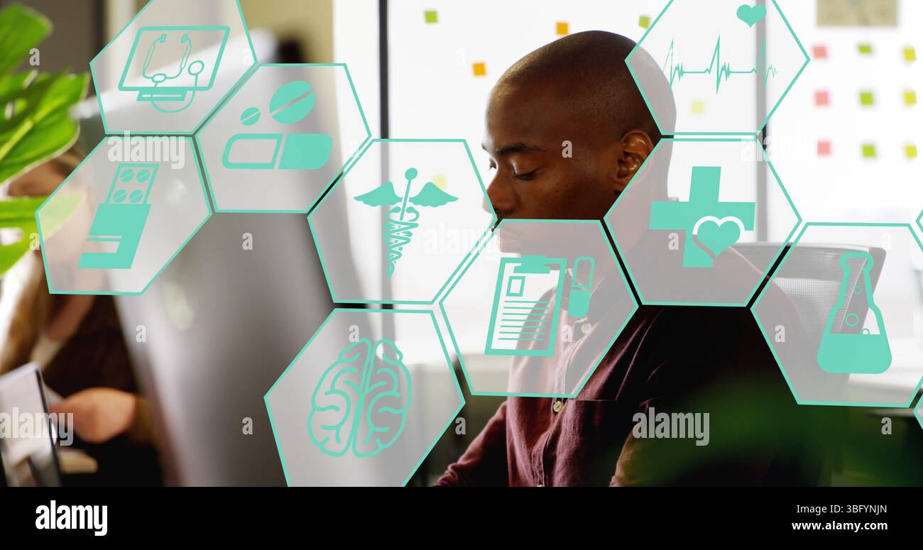 Image of scientific icons in hexagons over african american male ...