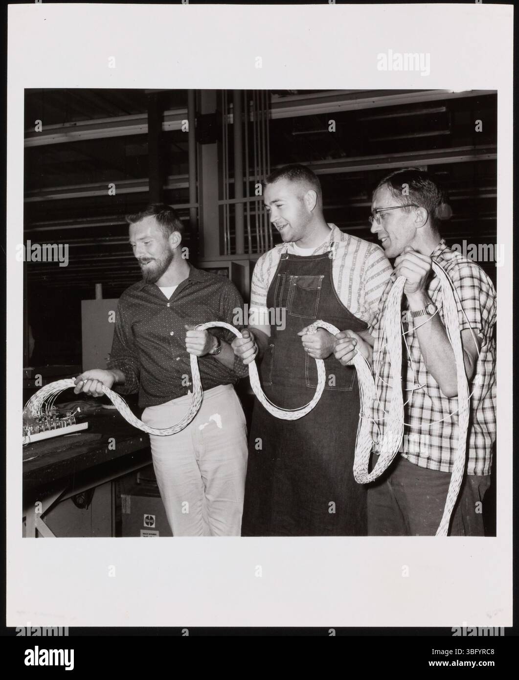 This set of photographs from 1961 depicts employees of Beckman ...