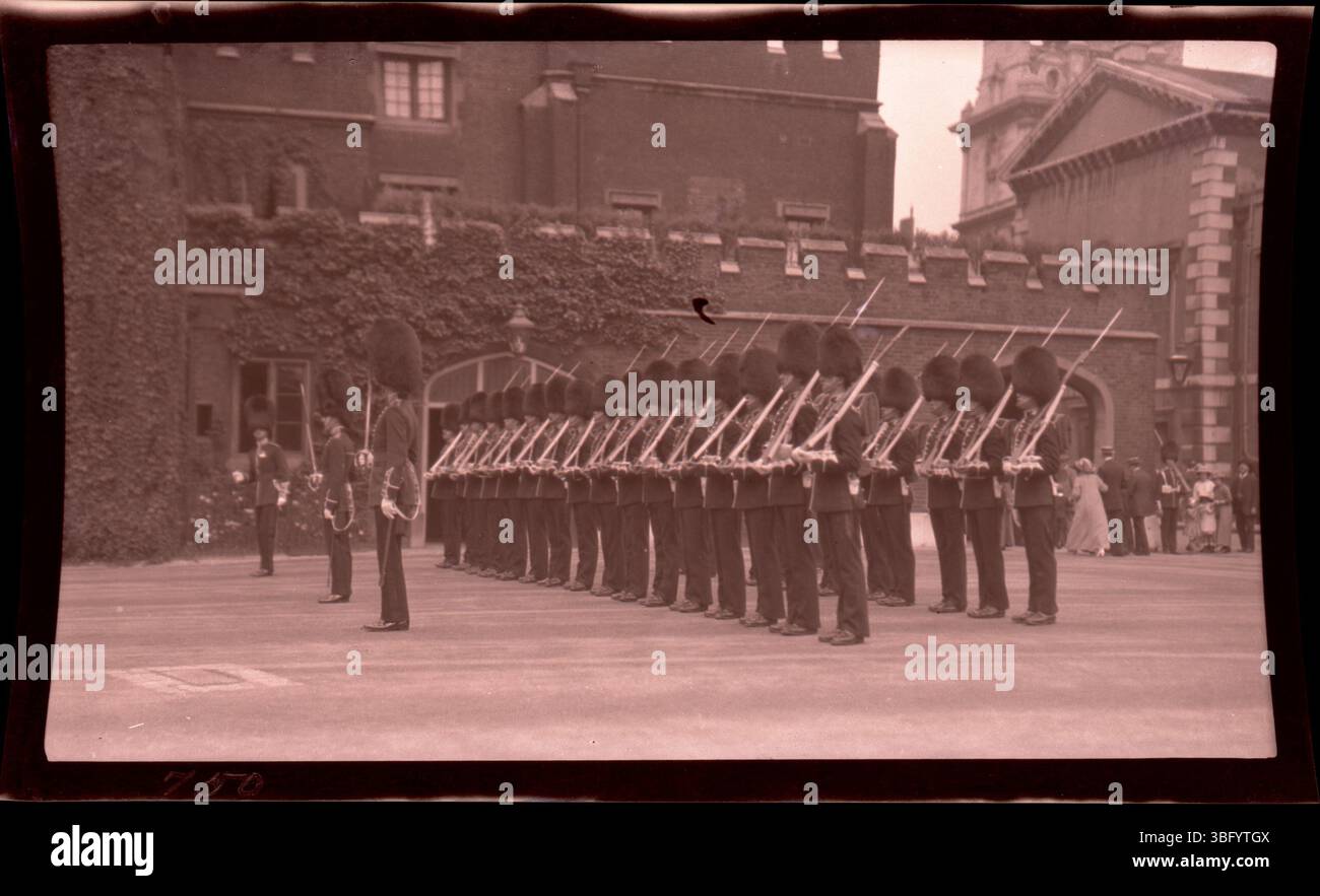 This 1913 photograph captures soldiers standing in line during the ...