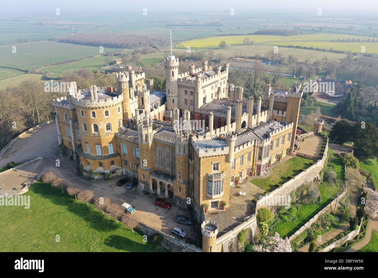 Drone image of Belvoir Castle in Leicestershire, England, showing its courtyard, towers, and ...