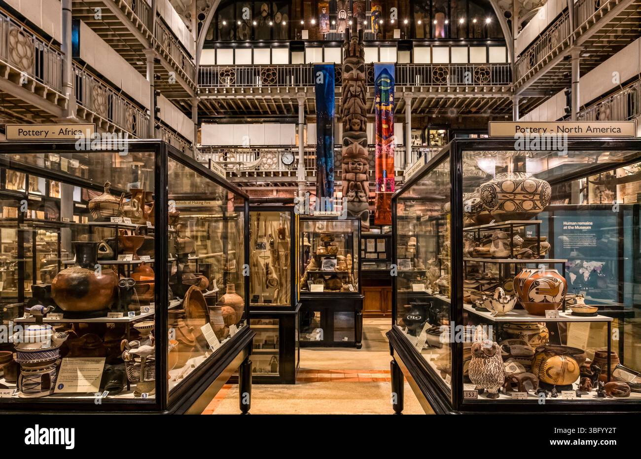 Display cabinets of pottery in Pitt Rivers Museum, Oxford, England, UK ...