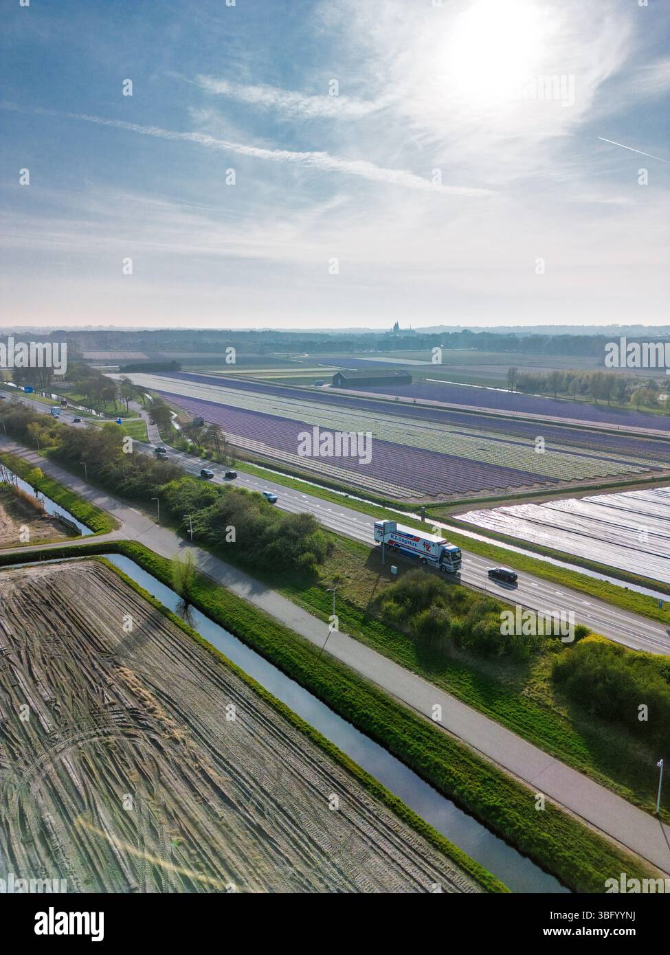 Green farmland stretching toward forest hi-res stock photography and ...