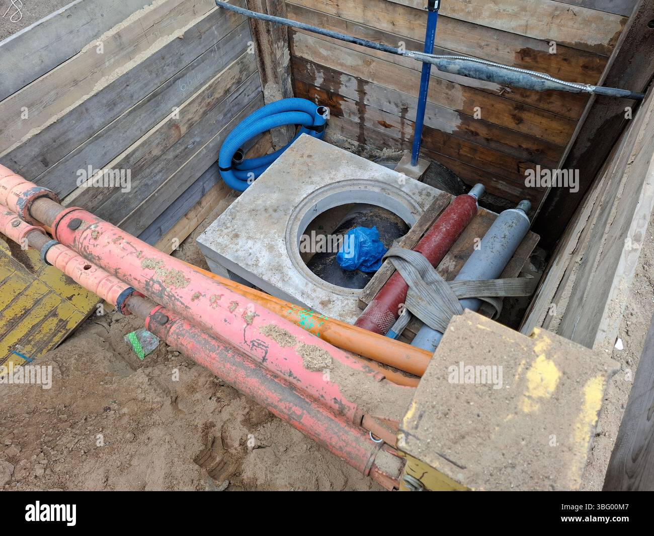 View into an excavation pit with massive supports for the construction ...
