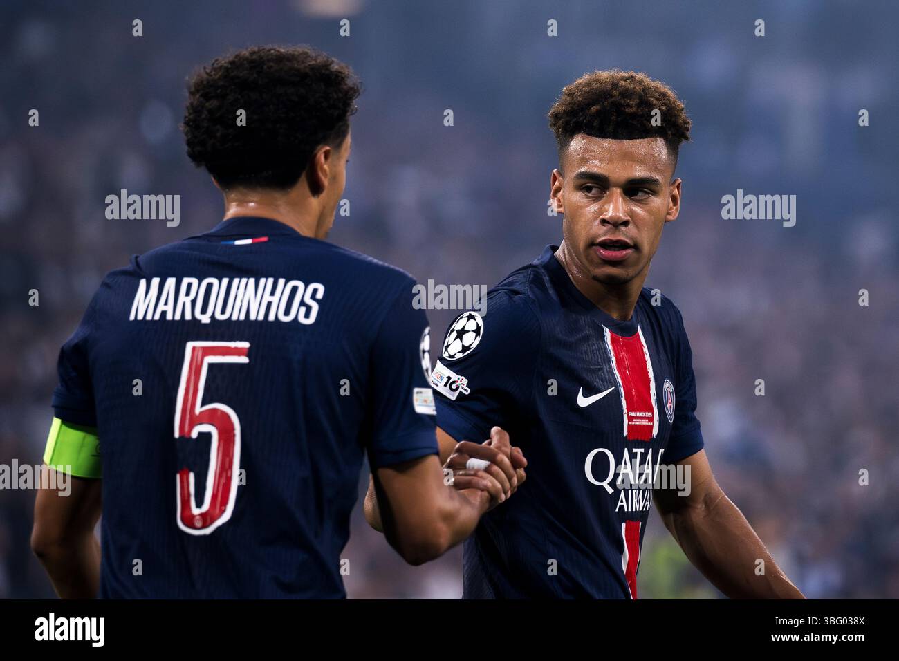 Desire Doue of Paris Saint-Germain celebrates with Marquinhos of Paris ...