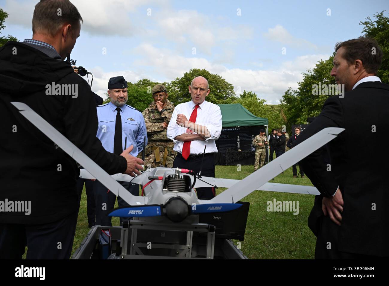 Britain's Defence Secretary John Healey, center, looks at the Storm ...