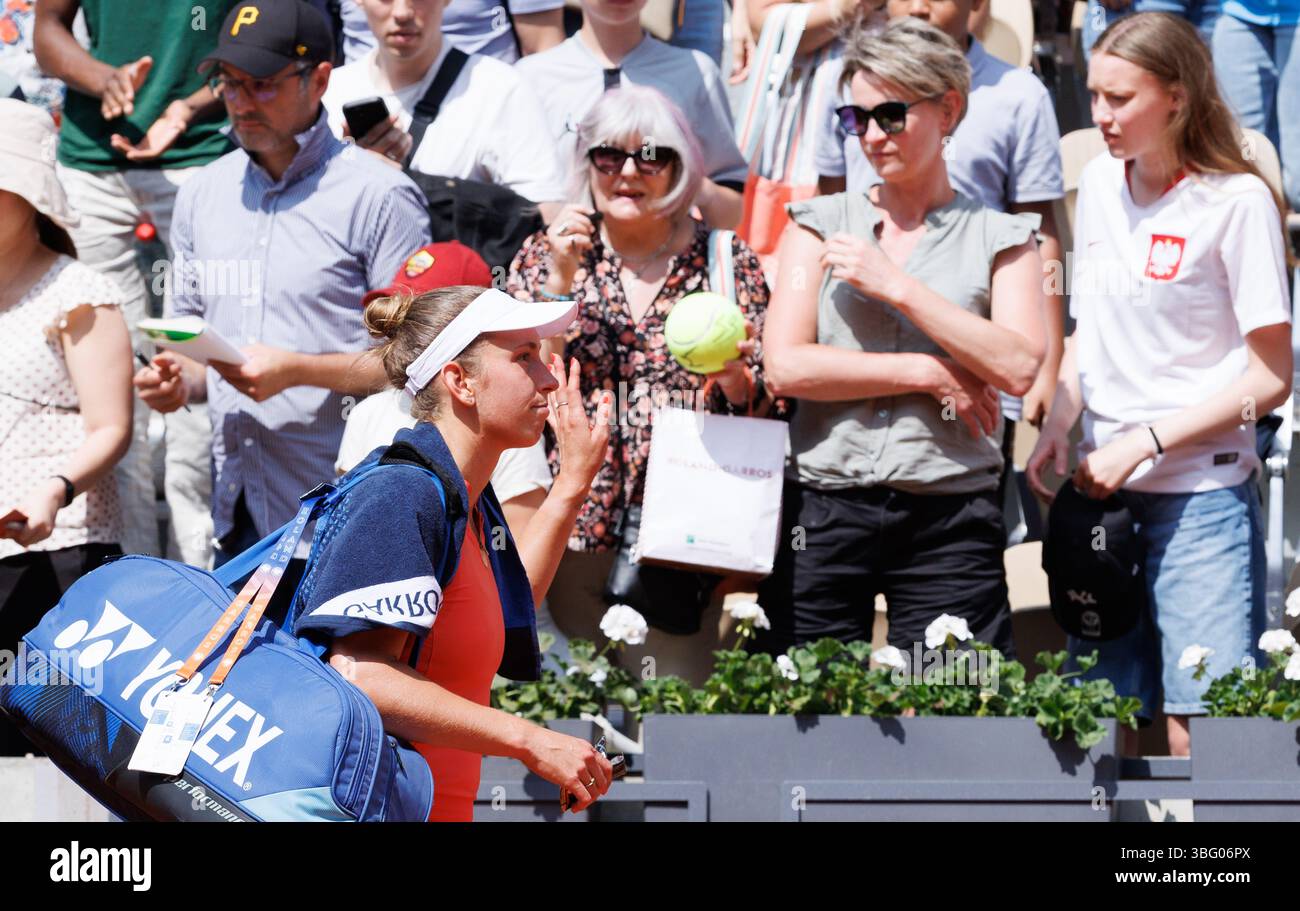 Paris, France. 03rd June, 2025. Belgian Elise Mertens looks dejected ...