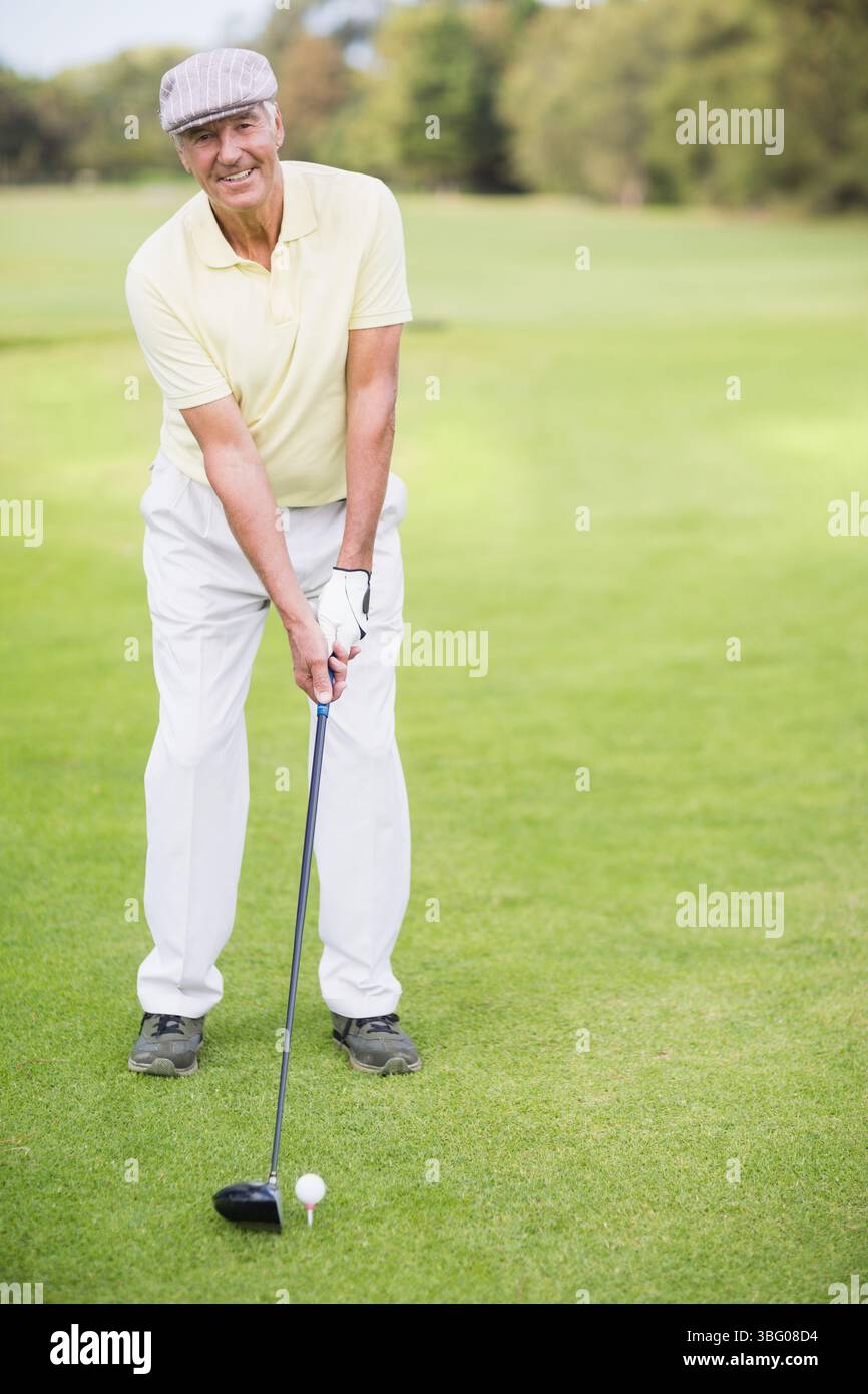 Senior golfer swinging driver on hi-res stock photography and images ...