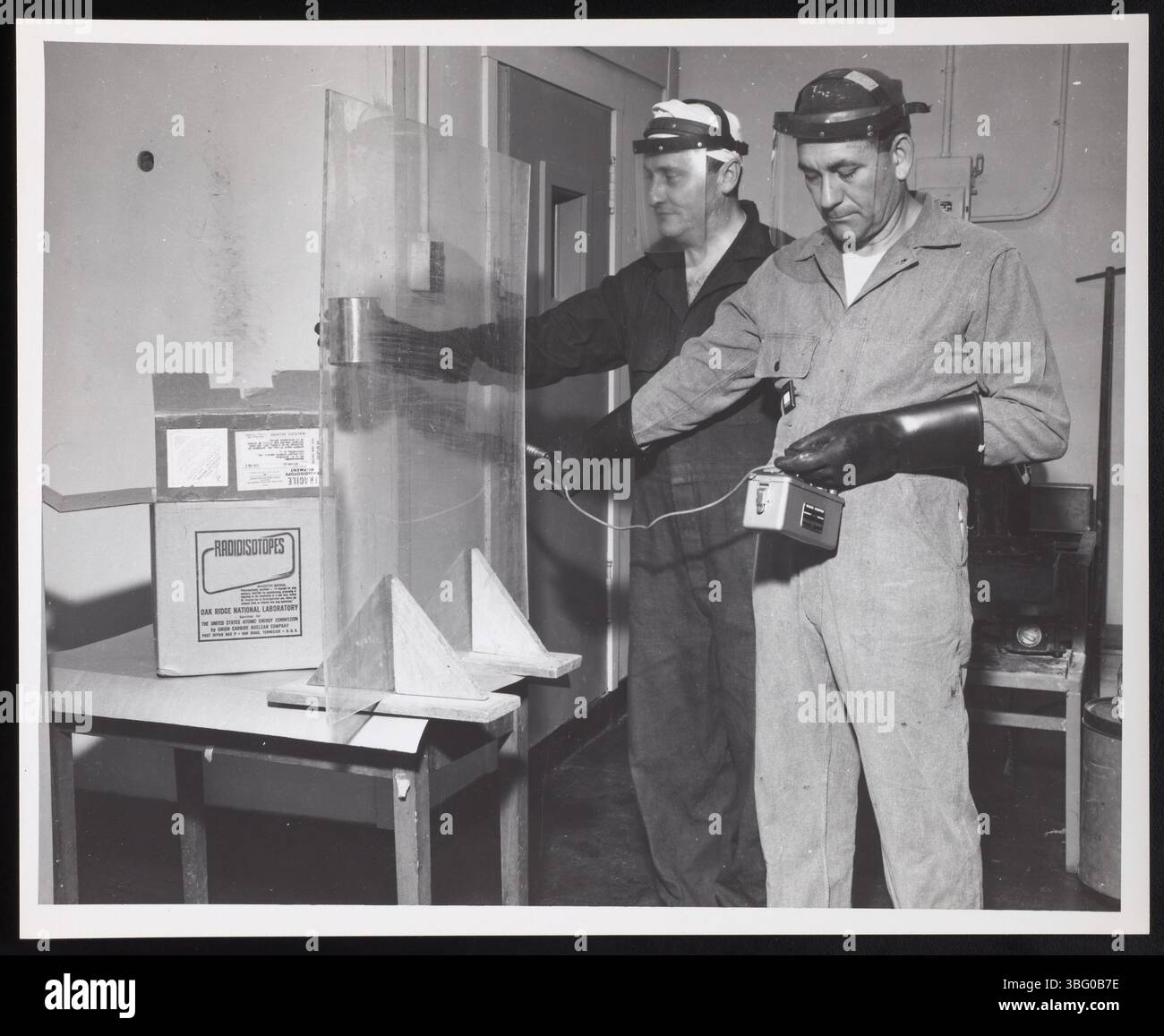 This 1950s photo shows chemist George Wieczorek and an unidentified ...