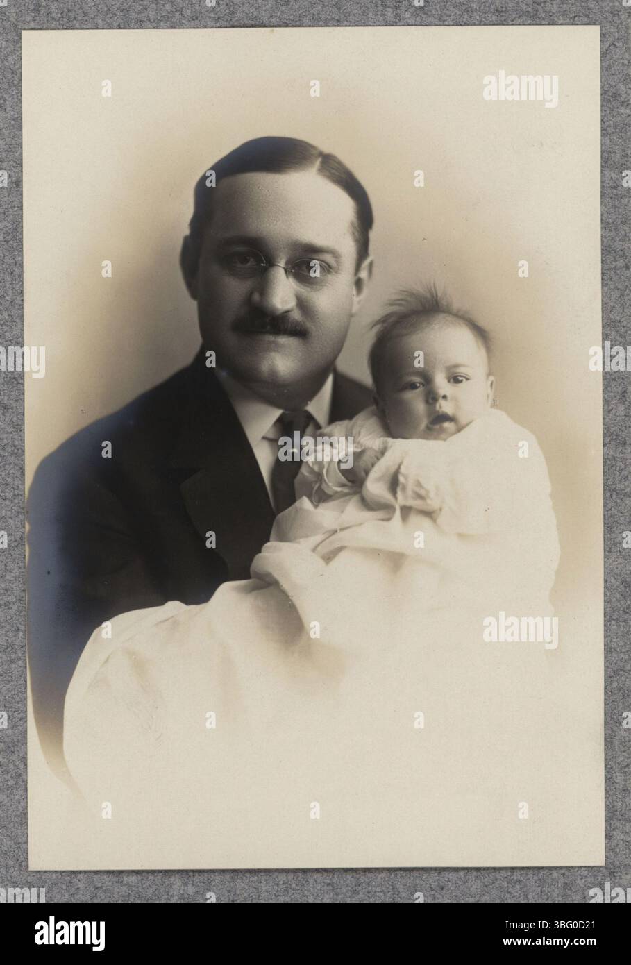 Conrad Edward Born, Sr. (1875-1953) holds his daughter, Katharine ...