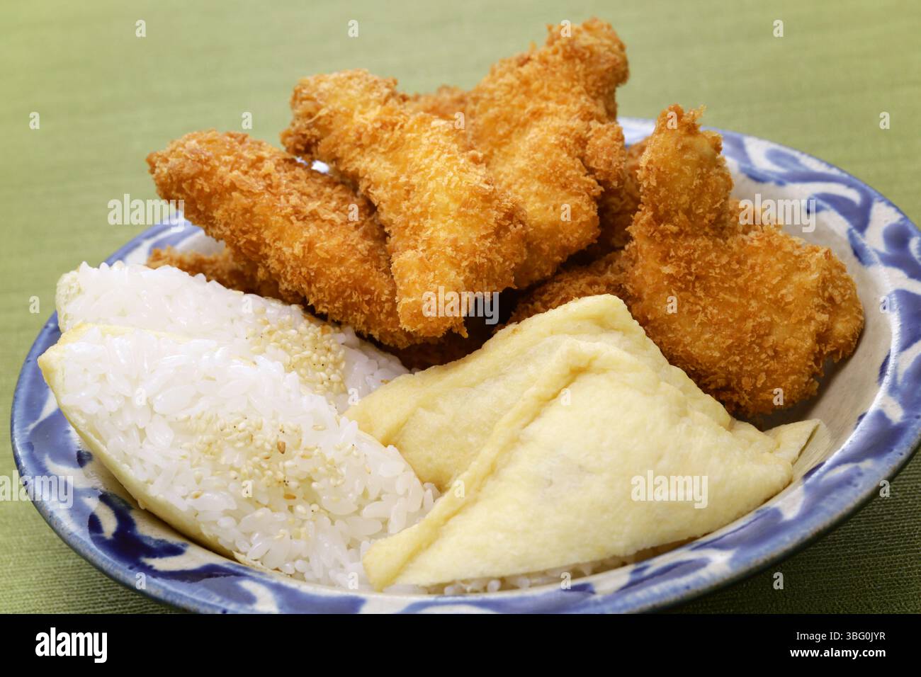 Inarizushi (vinegared rice wrapped in deep-fried bean curd) and garlic ...