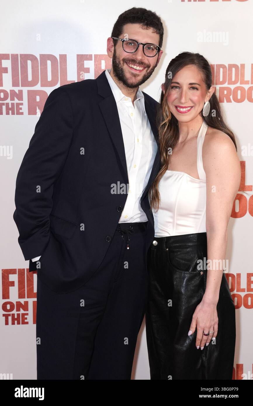 Brian Lee and Dayna Lee attending the press night of Fiddler on the Roof at the Barbican Theatre ...