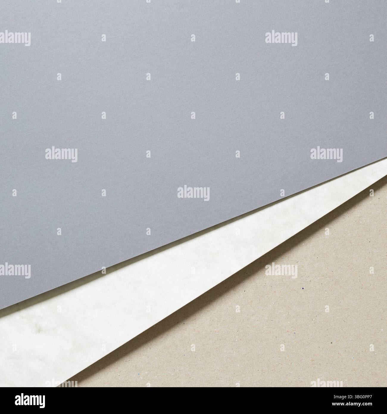 Abstract beige gray tone paper layer background Stock Photo - Alamy