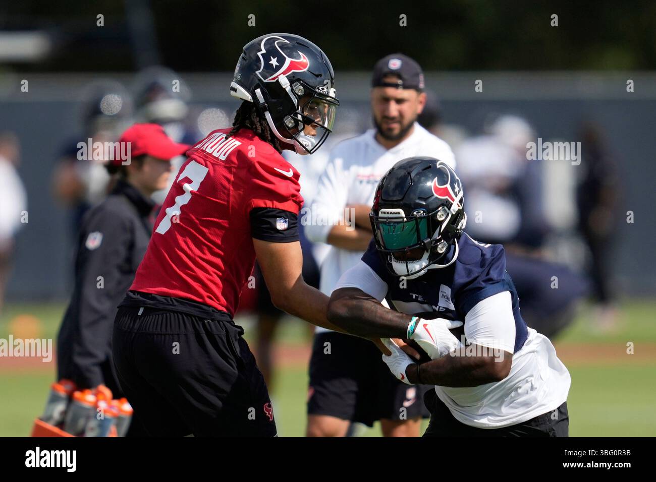 Houston Texans quarterback C.J. Stroud (7) and running back J.J. Taylor ...