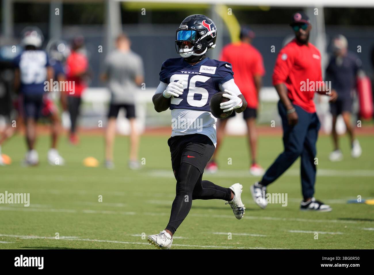 Houston Texans running back J.J. Taylor (26) works out during NFL ...
