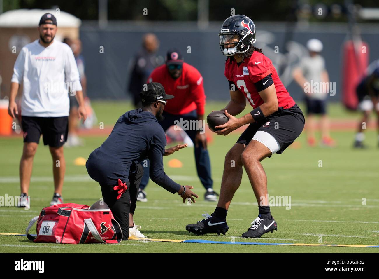 Houston Texans quarterback C.J. Stroud (7) works out during NFL ...