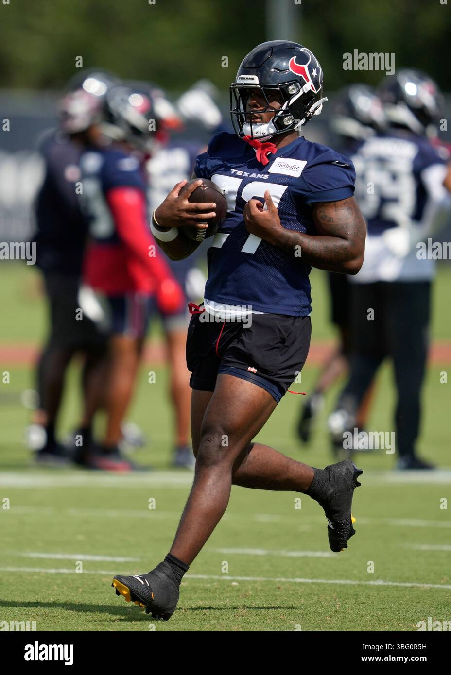 Houston Texans running back Woody Marks (27) works out during NFL ...