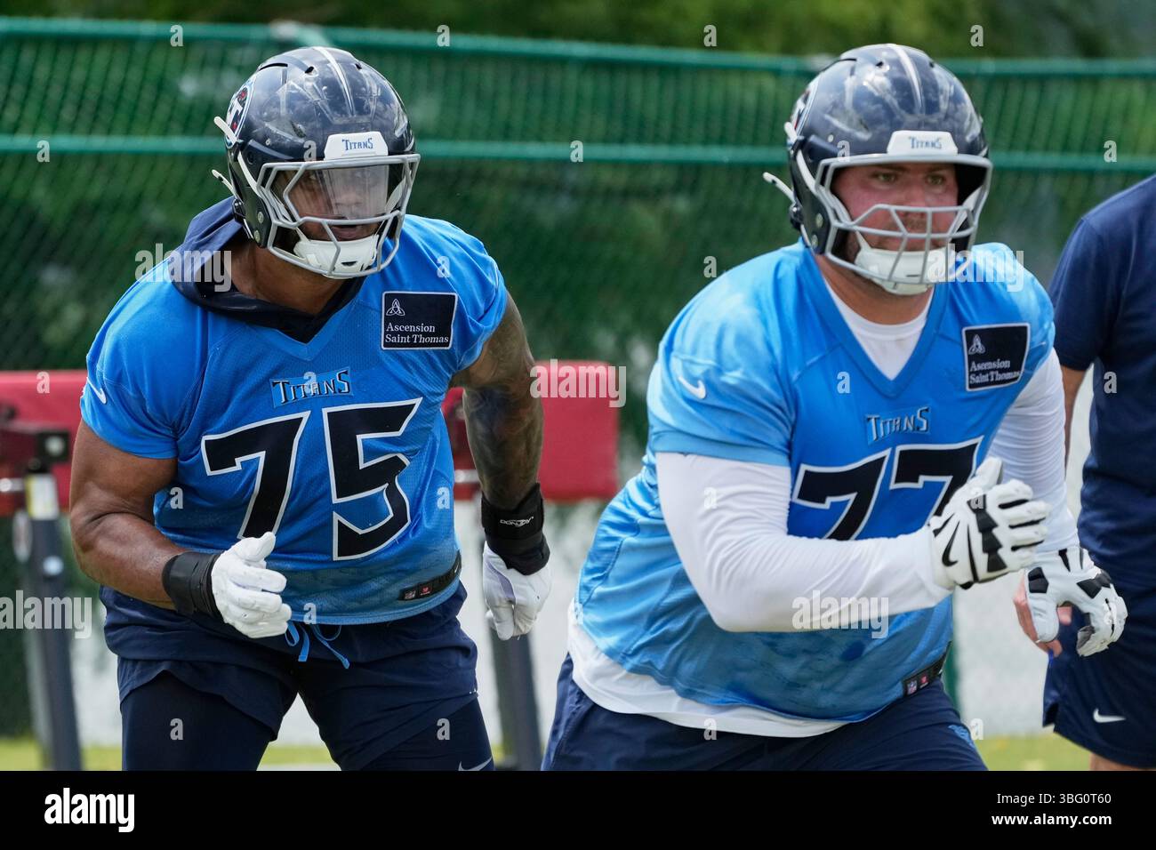 Tennessee Titans offensive tackle Dan Moore Jr. (75) and offensive ...