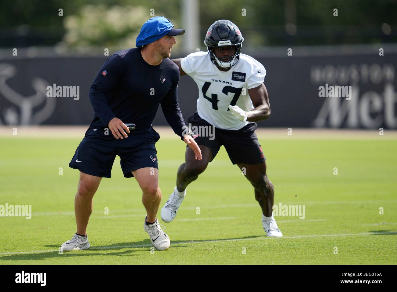 Houston Texans linebacker K.C. Ossai (47) works out during NFL football ...