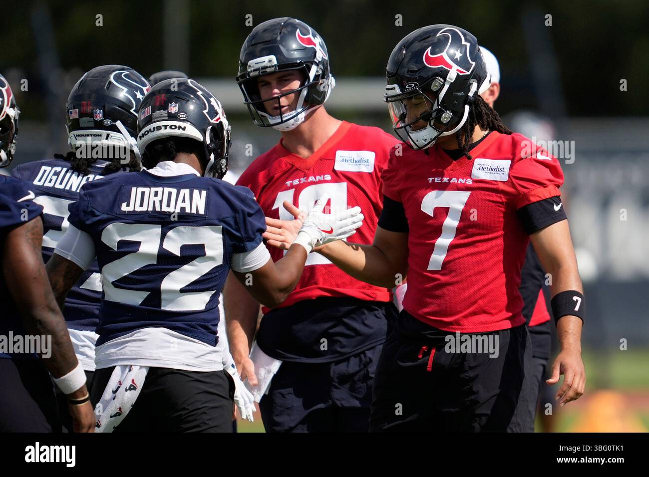 Houston Texans running back Jawhar Jordan (22) greets quarterback C.J ...