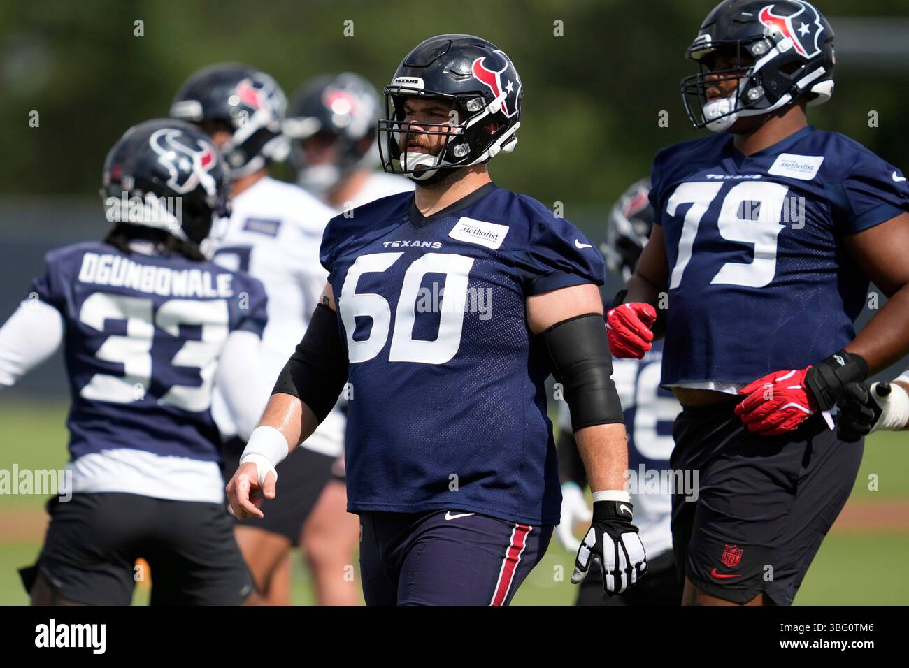 Houston Texans center Jake Andrews (60) works out during NFL football ...