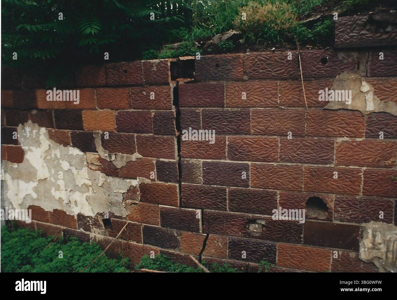 A close-up photograph of a terra cotta brick wall, showcasing its ...