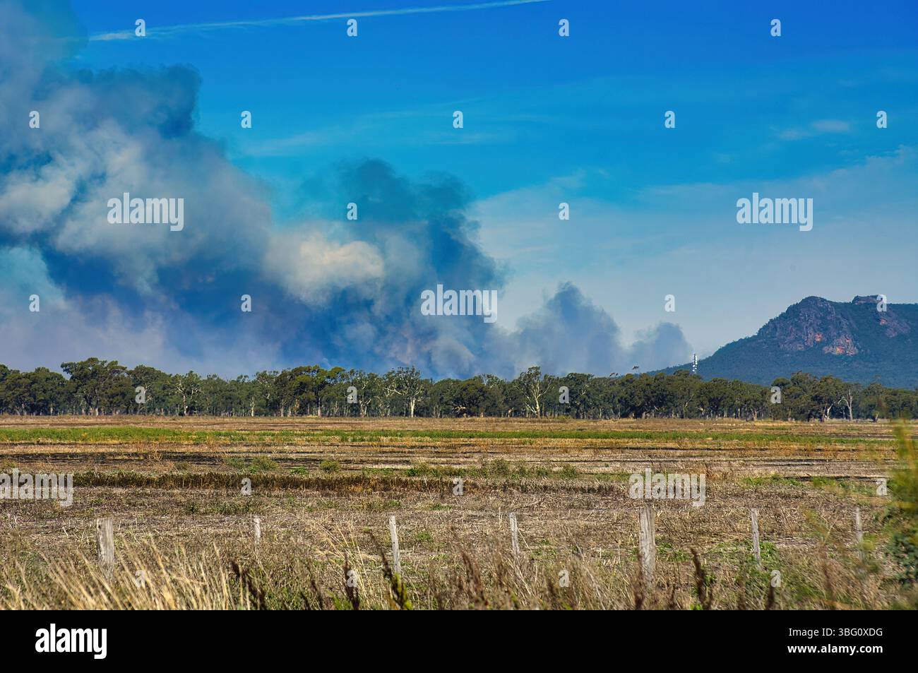 Dense smoke from a bushfire in the foothills of the Grampians, Victoria ...