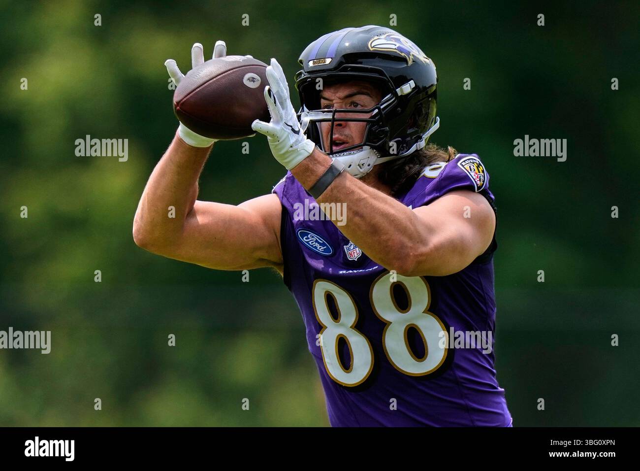 Baltimore Ravens tight end Charlie Kolar (88) works out during an NFL ...