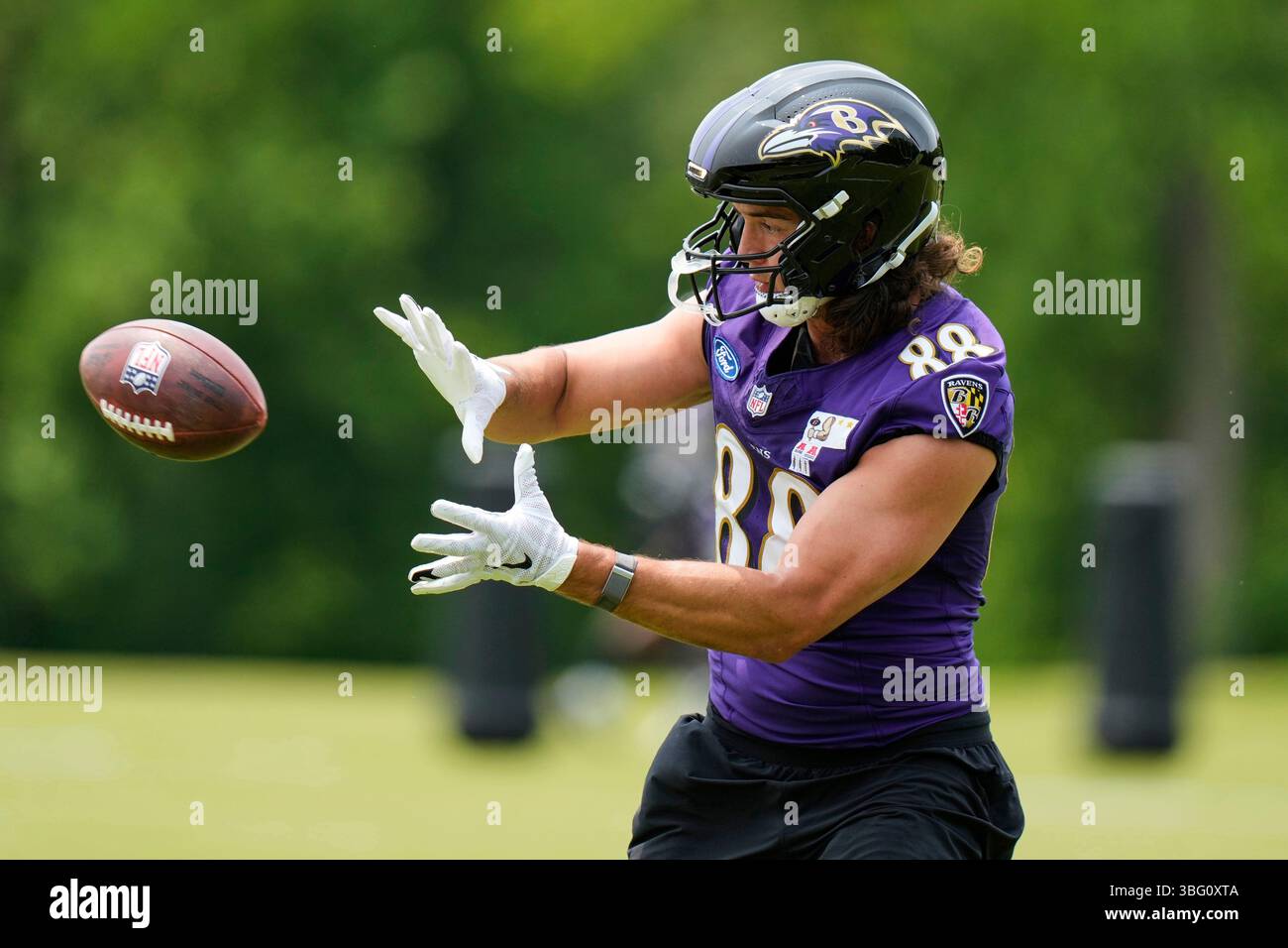 Baltimore Ravens tight end Charlie Kolar (88) works out during an NFL ...
