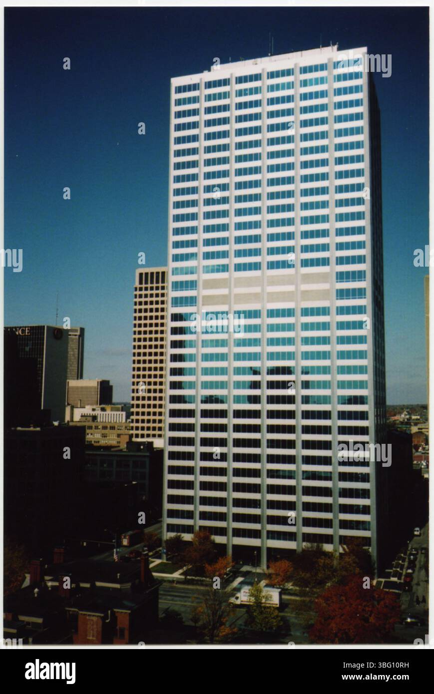 The Borden Building, a modernist skyscraper, stands 438 feet tall with ...