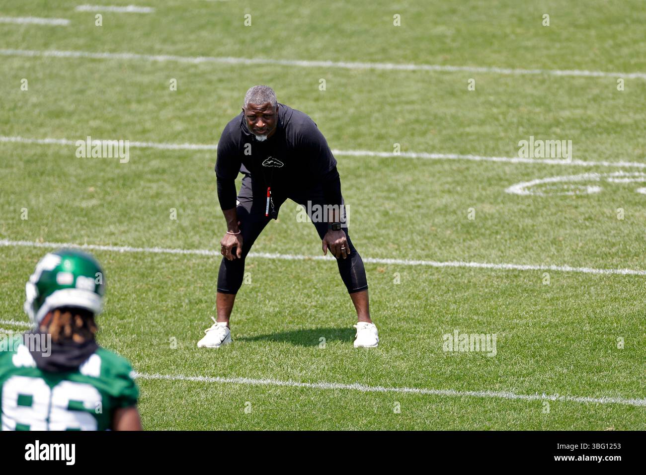 New York Jets head coach Aaron Glenn looks on during an NFL football ...