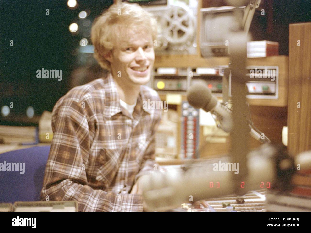 In 1983, DJ Kent Jones is seen speaking into a microphone at WTVN radio ...