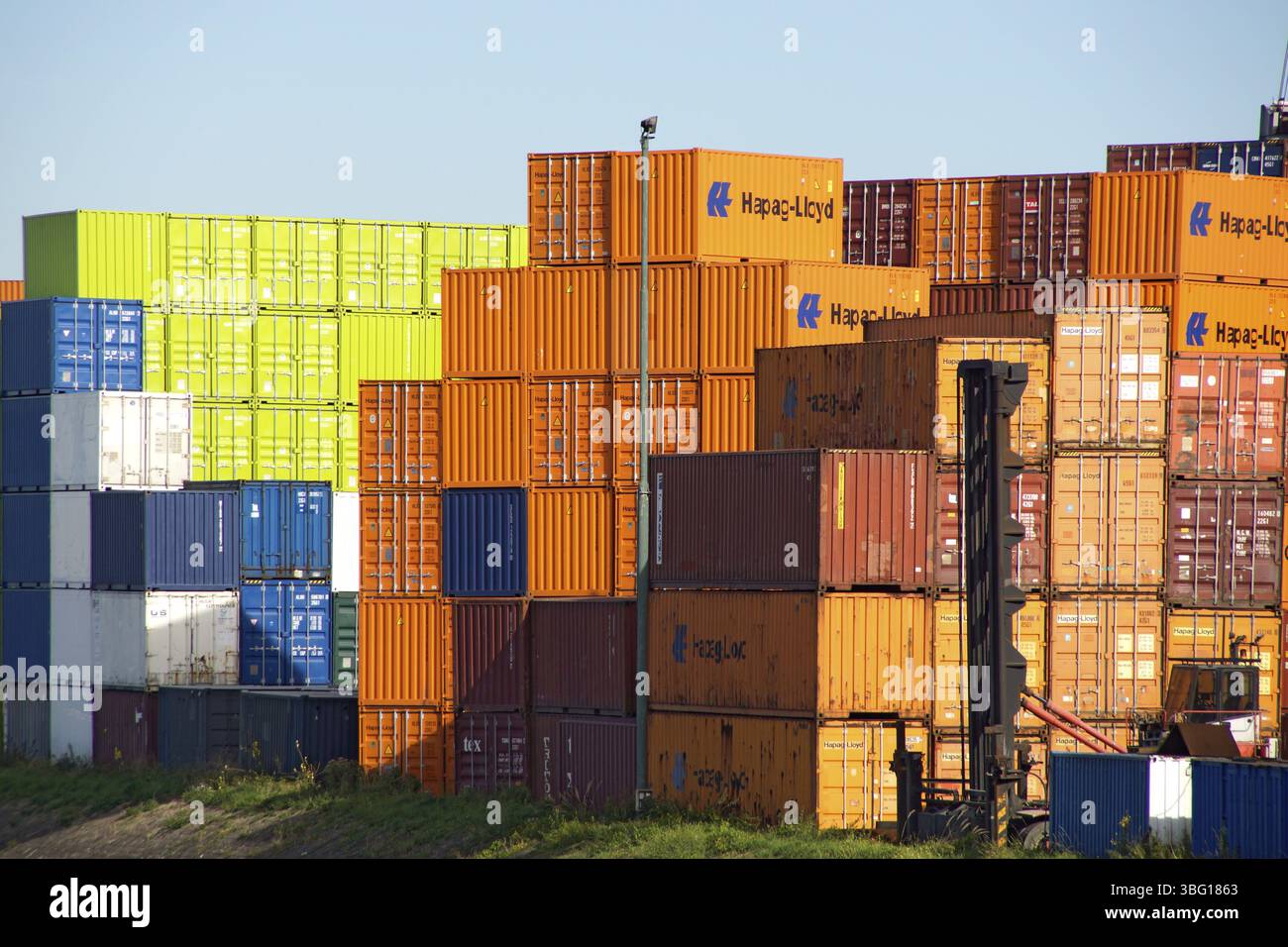 Stacked sea containers in the port of Rotterdam Stock Photo - Alamy