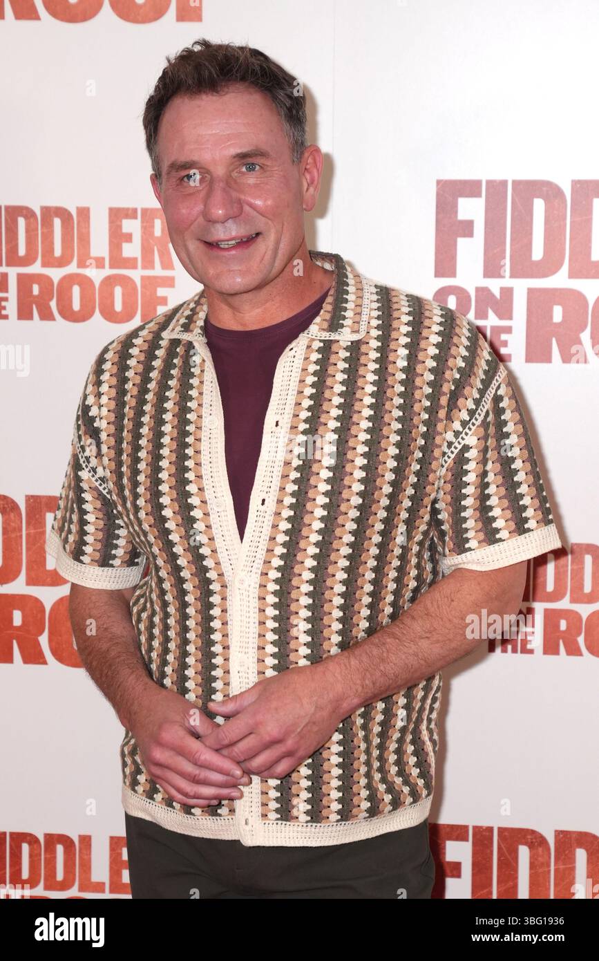 Richard Arnold attending the press night of Fiddler on the Roof at the ...