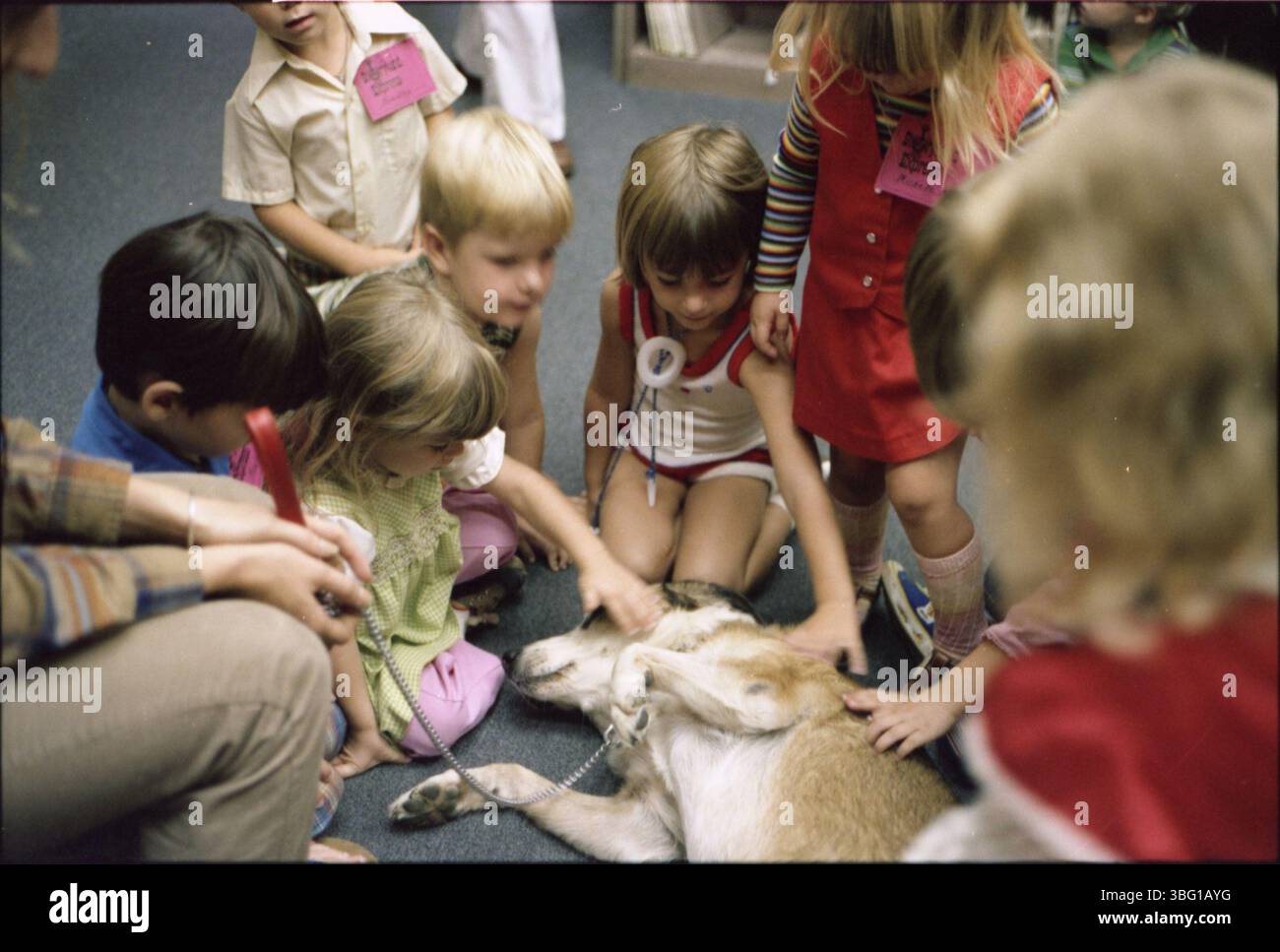 This image shows children participating in a program at the Hilltop ...
