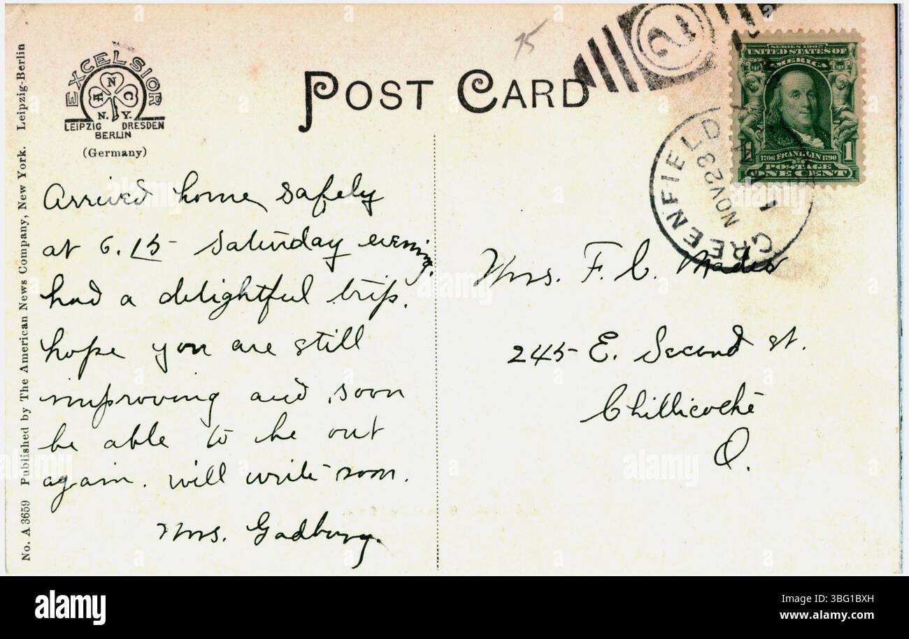 A black and white postcard of the public school building in Greenfield ...