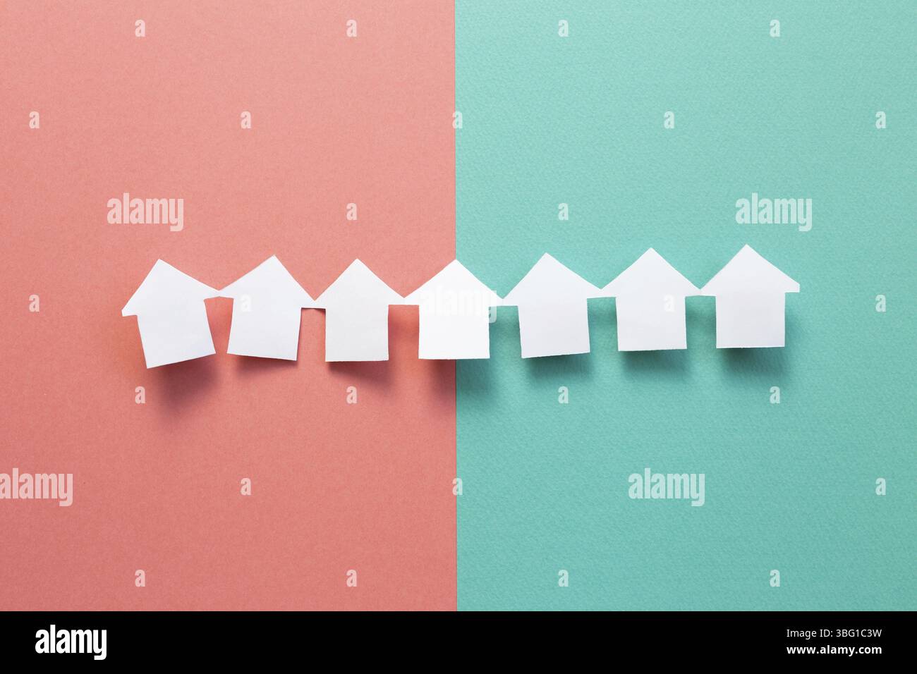 Paper house model on pink green background. Real estate concept Stock ...