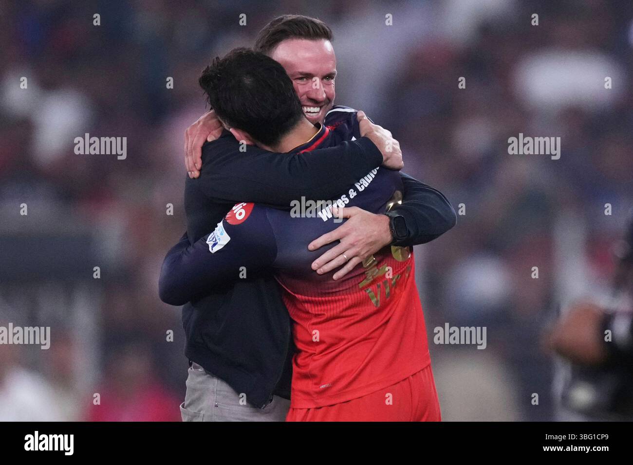 Royal Challengers Bengaluru's Virat Kohli, right, hugs to celebrate ...