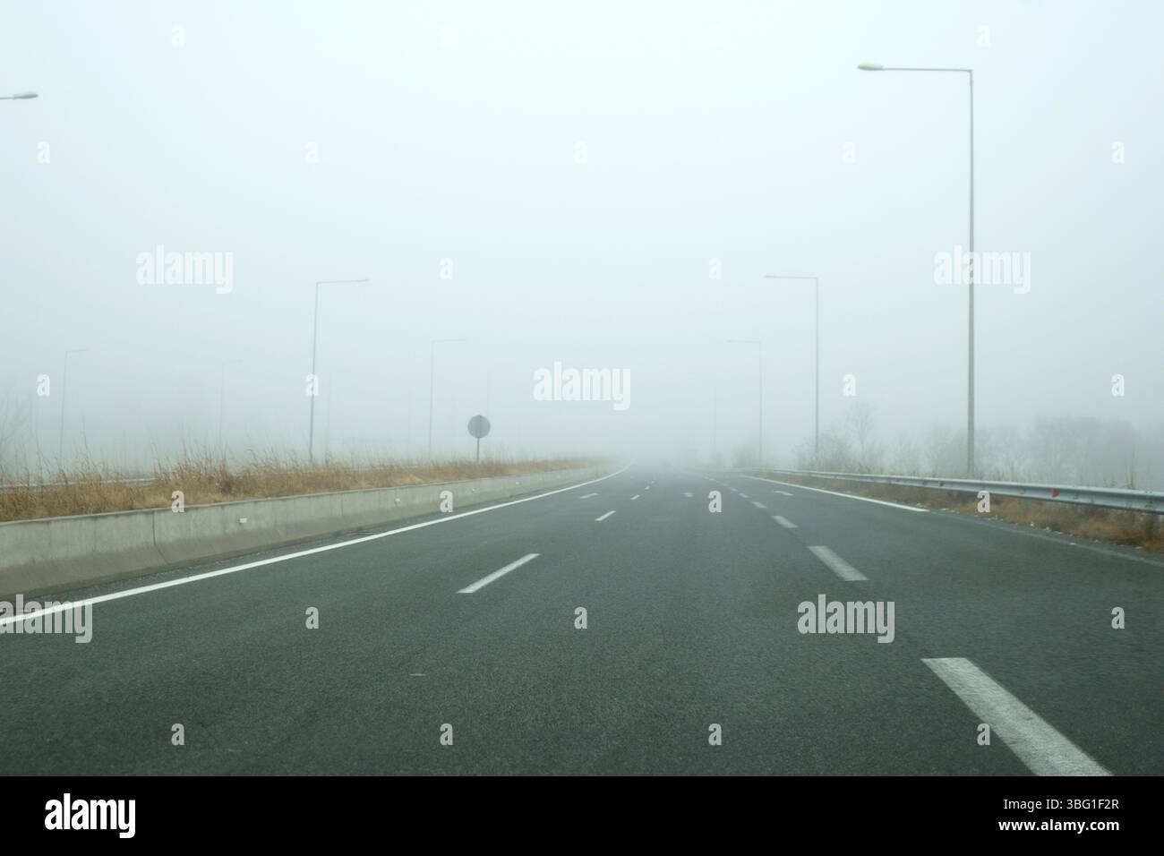 Pov driving on foggy road hi-res stock photography and images - Alamy