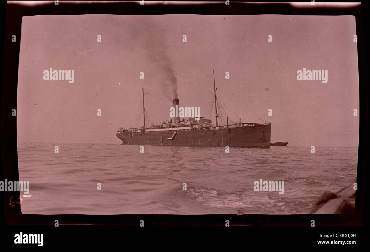 The S.S. Canopic, a steamship, is seen docked in the Port of Funchal ...