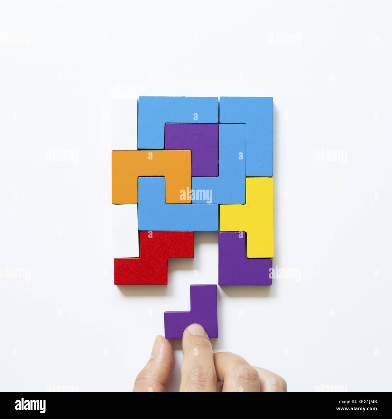 Hand set puzzle pieces hi-res stock photography and images - Alamy