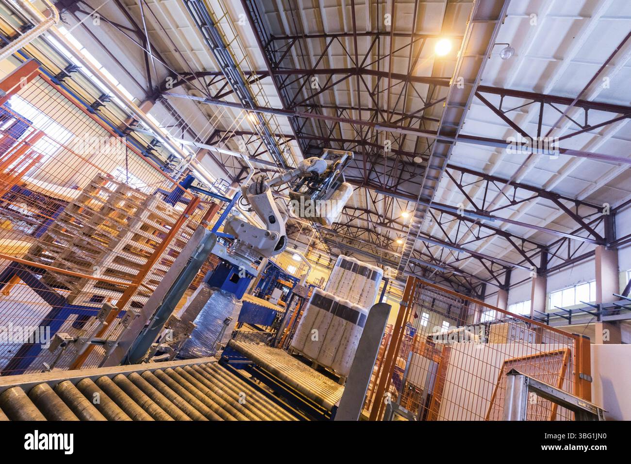 Factory workshop interior and machines on glass industry background ...