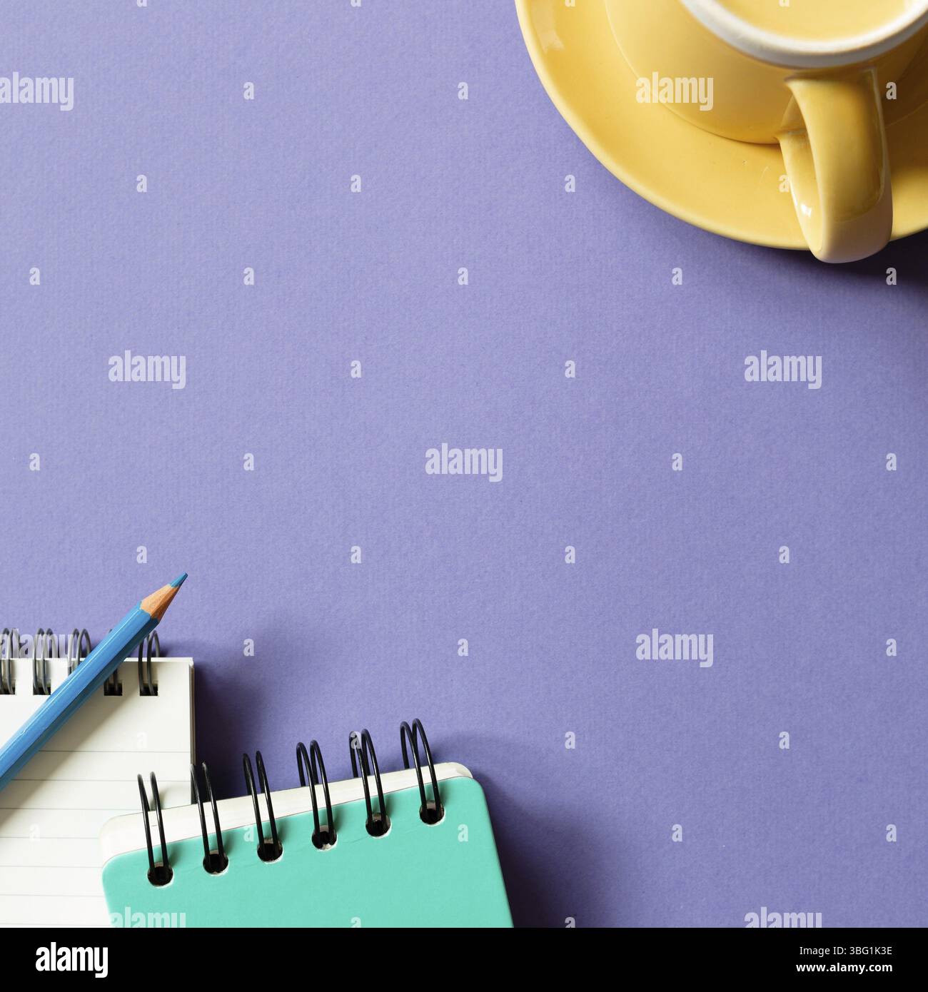Notepad and mug cup on purple background. flat lay, top view, copy ...