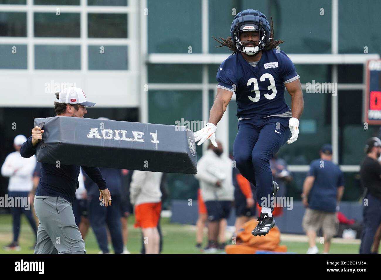 Chicago Bears running back Ian Wheeler runs a drill during NFL football ...